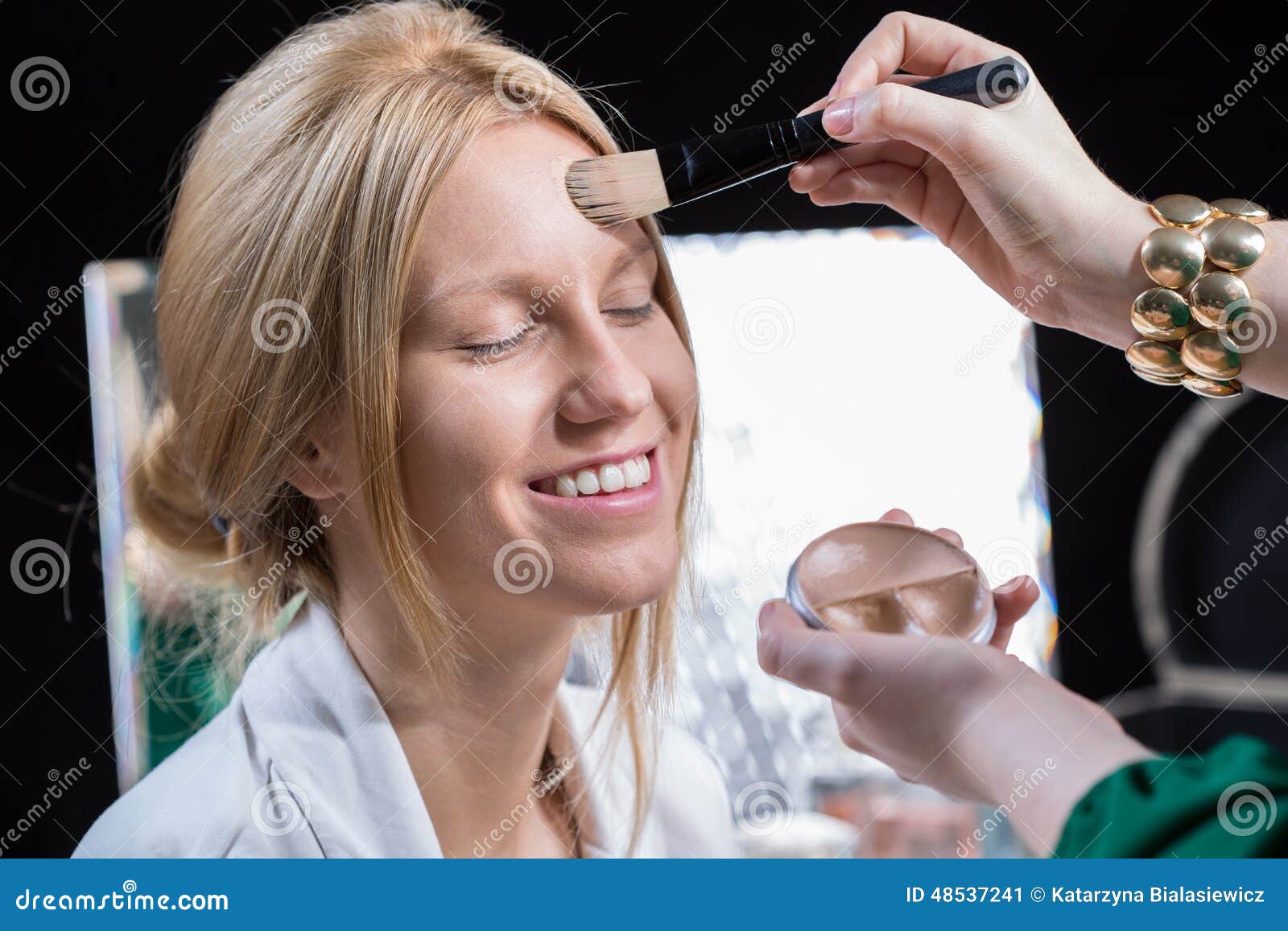 Visagiste putting fluid stock image. Image of beautiful - 48537241