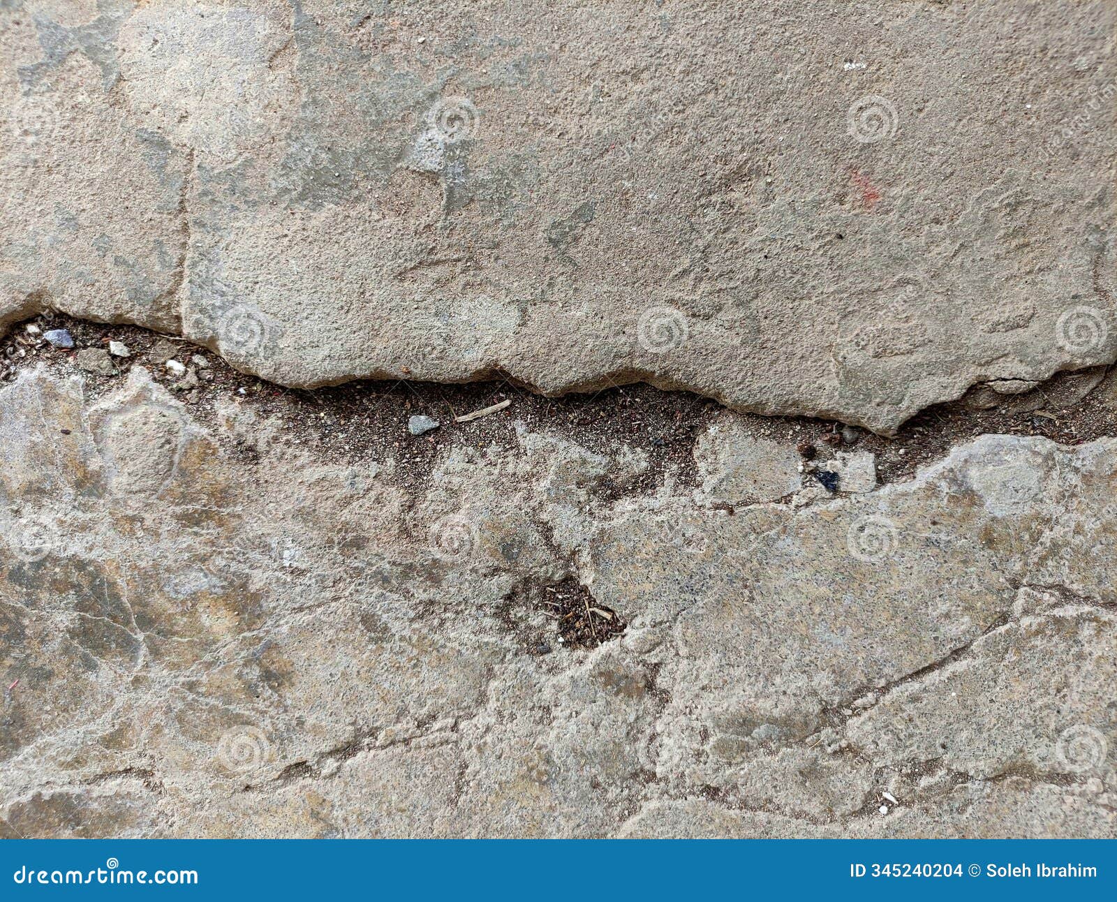 Visible cracks in a floor stock photo. Image of soil - 345240204