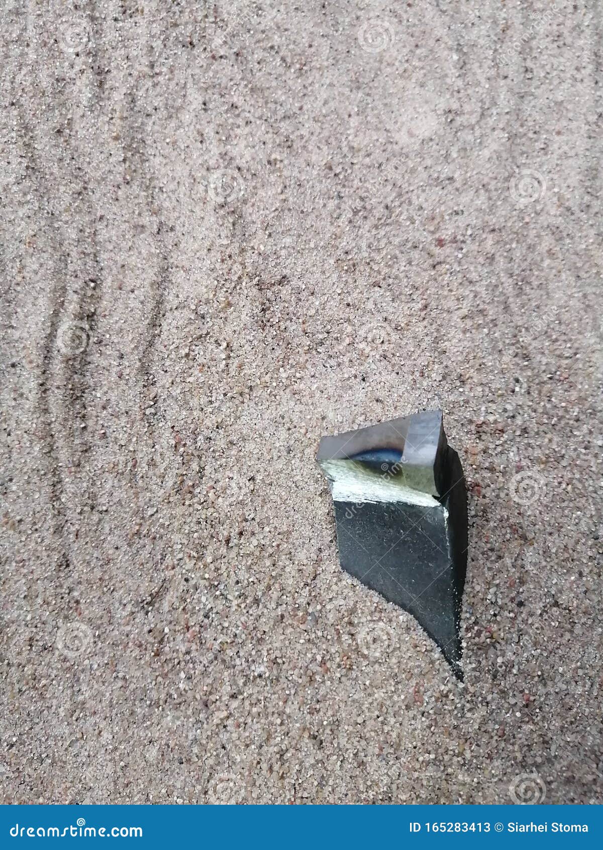 Visible Part of the Sharp Tip of the Tool for Turning in the Sand Stock ...