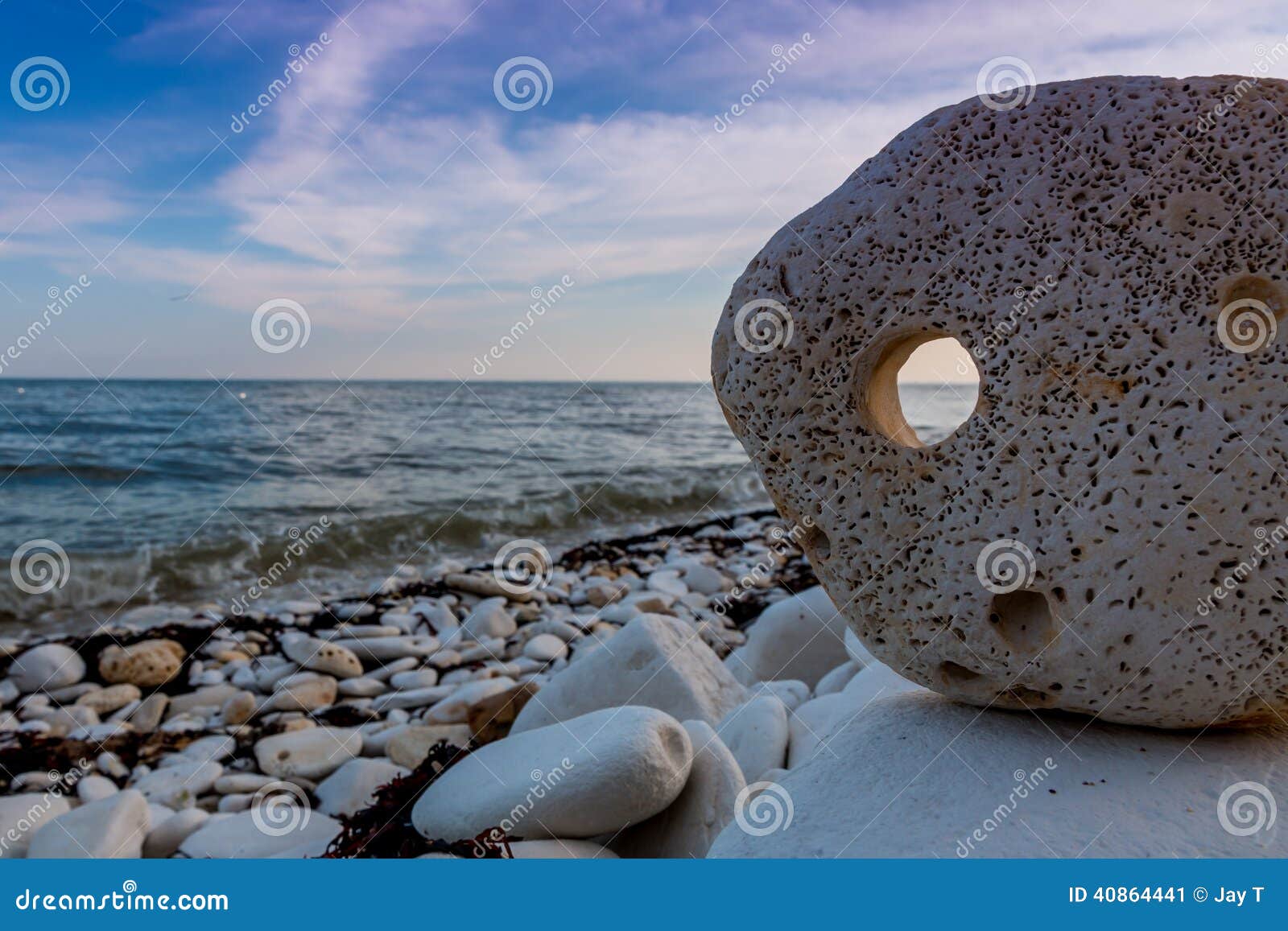 Hollow stone on beach stock image. Image of future, lovender - 40864441