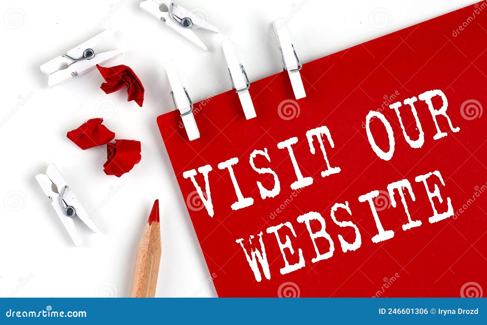 VISIT OUR WEBSITE Text on Red Paper with Office Tools on White ...