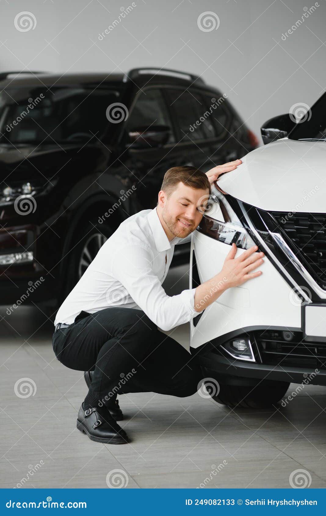 Visiting Car Dealership. Handsome Bearded Man is Stroking His New Car ... Visiting Car Dealership. Handsome Bearded Man is Stroking His New Car ...
