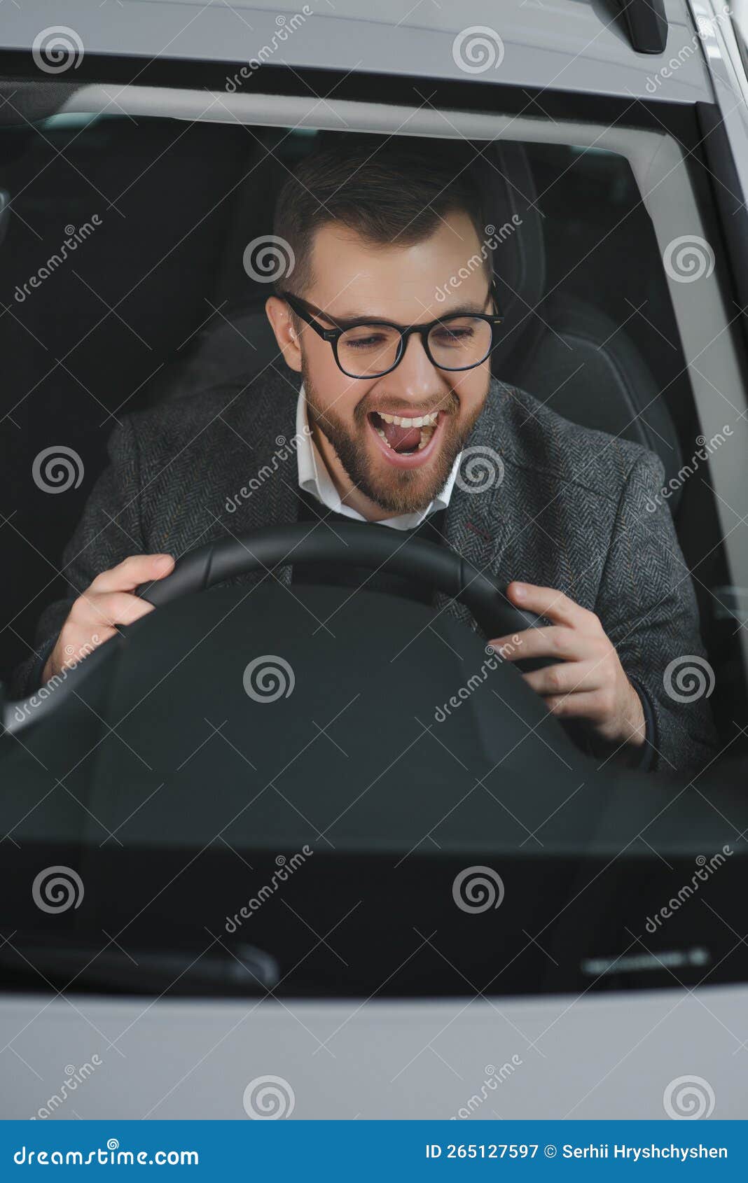 Visiting Car Dealership. Handsome Bearded Man is Stroking His New Car ... Visiting Car Dealership. Handsome Bearded Man is Stroking His New Car ...