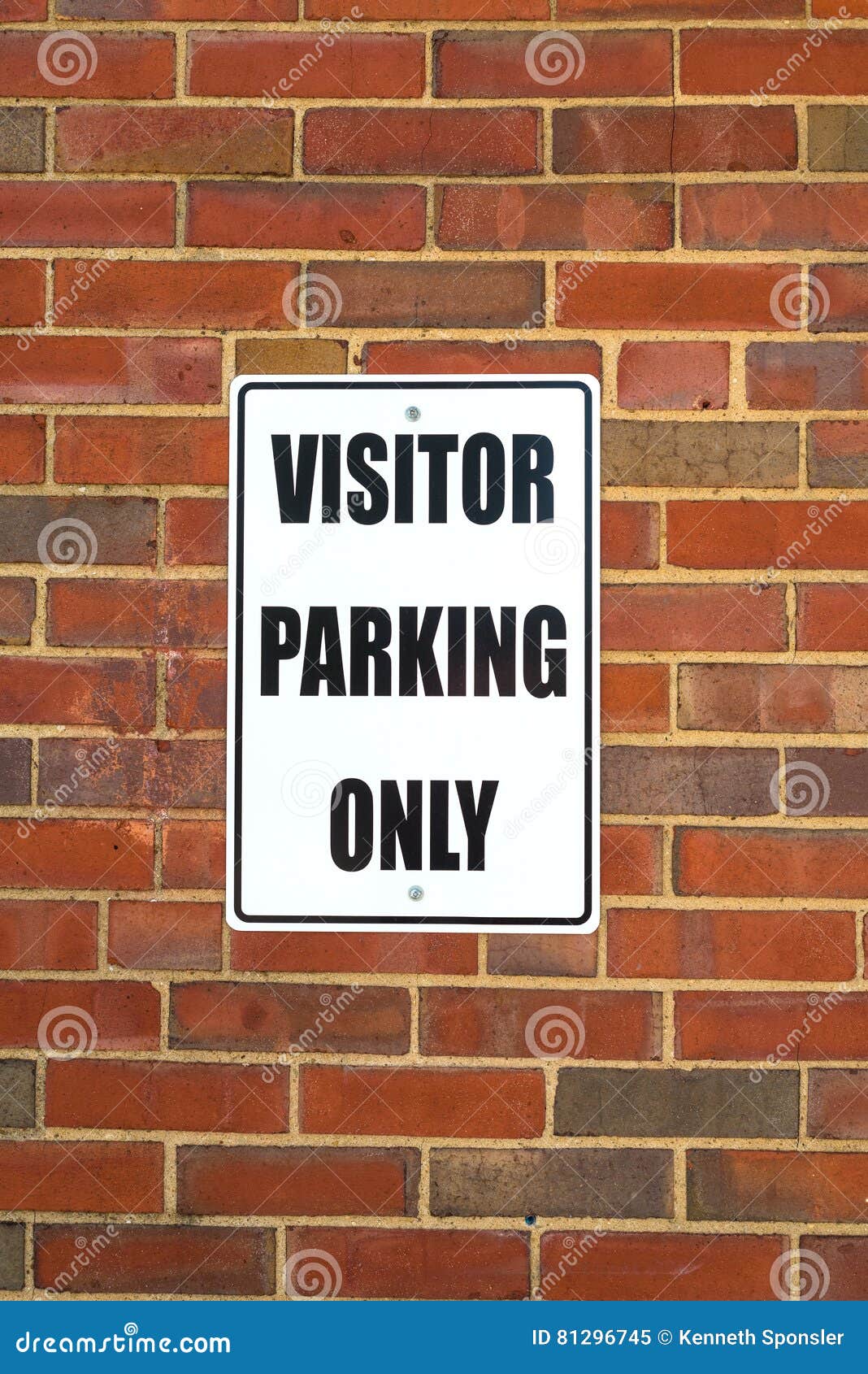 A Visitor Parking Sign On A Red Brick Wall Royalty-Free Stock ...