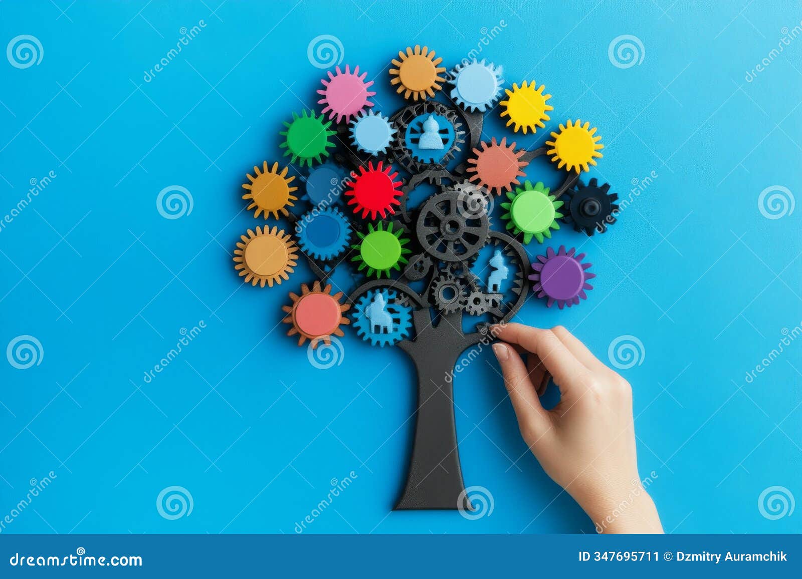 A Visual of Interlocking Gears and a Tree with Human Figures ...