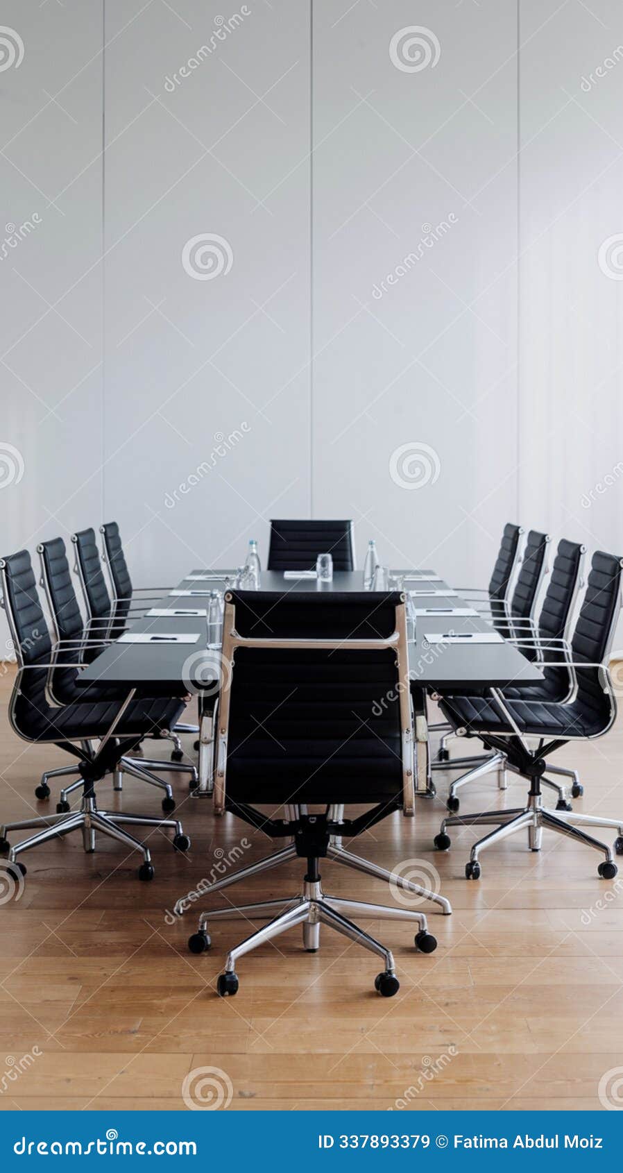 Sleek Conference Room with Long Table and Black Chairs, Minimalist ...
