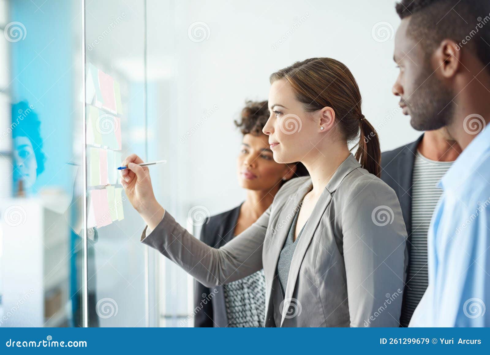 Visualising a Winning Idea Come Together. a Group of Colleagues Having ...