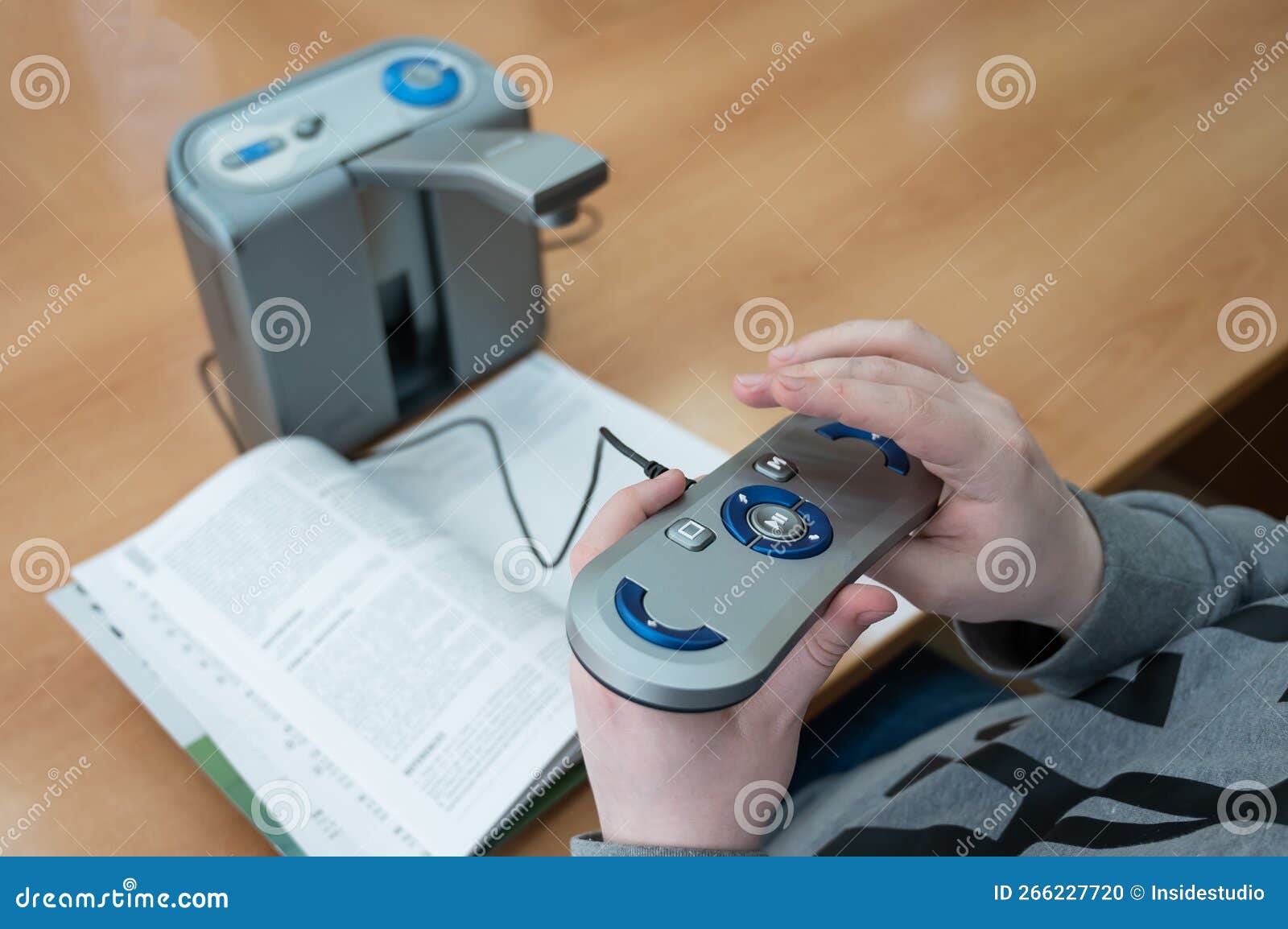 A Visually Impaired Man Uses a Scanning and Reading Machine. Stock ...