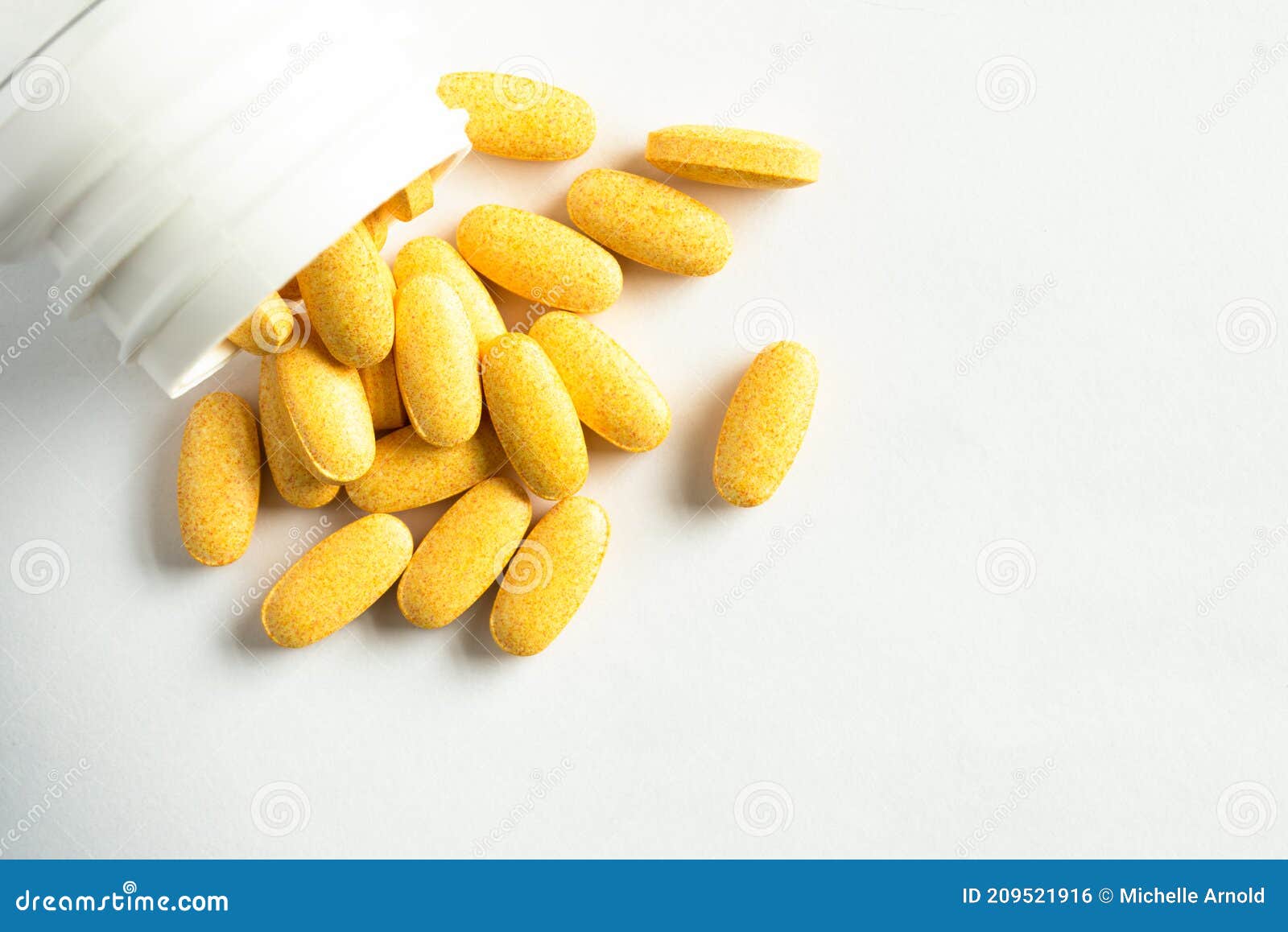 Vitamin B Complex Supplements Spilled from a Jar Stock Photo - Image of ...