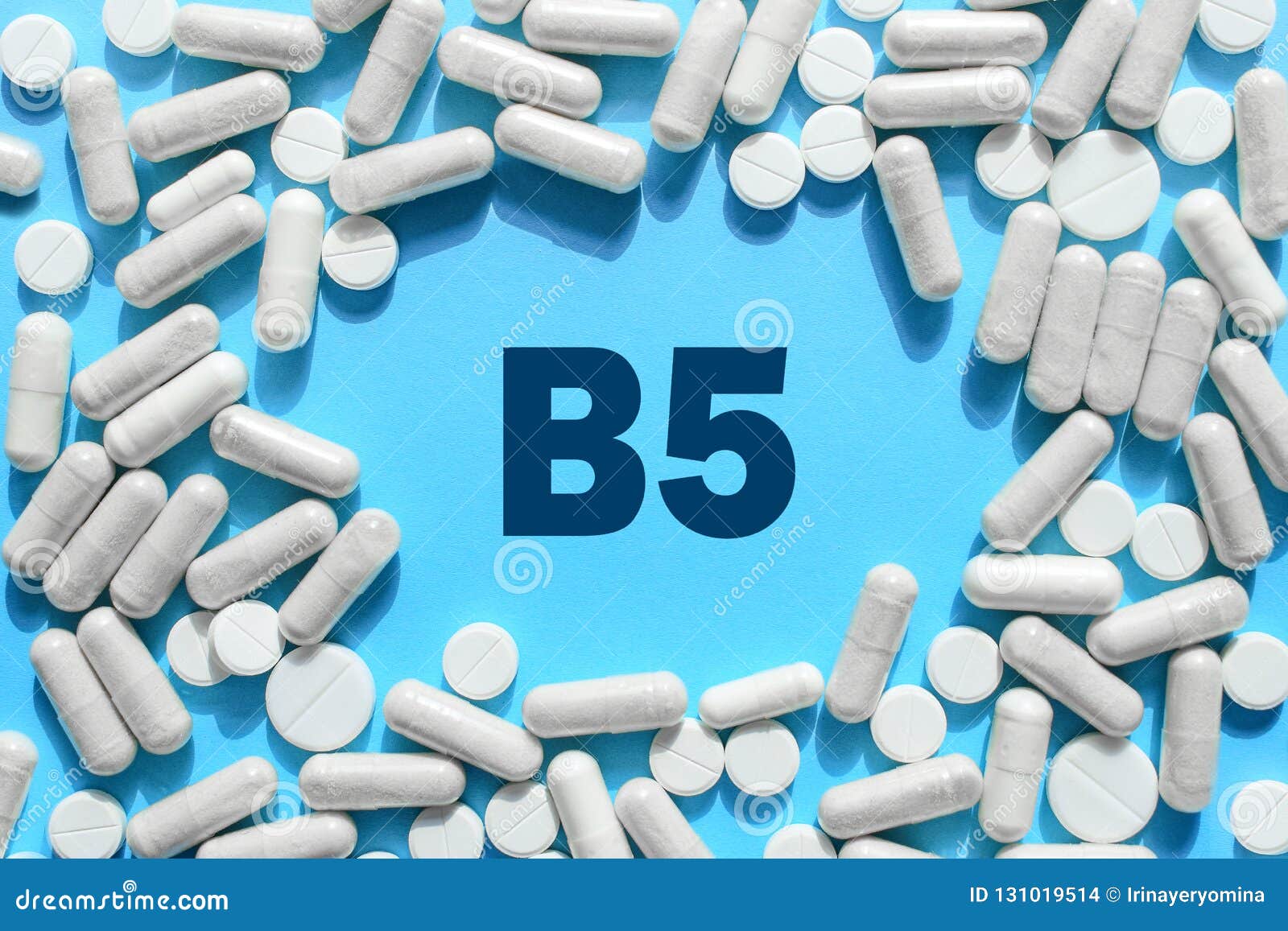 Vitamin B5 Text in White Capsules Frame on Blue Background Stock Photo ...