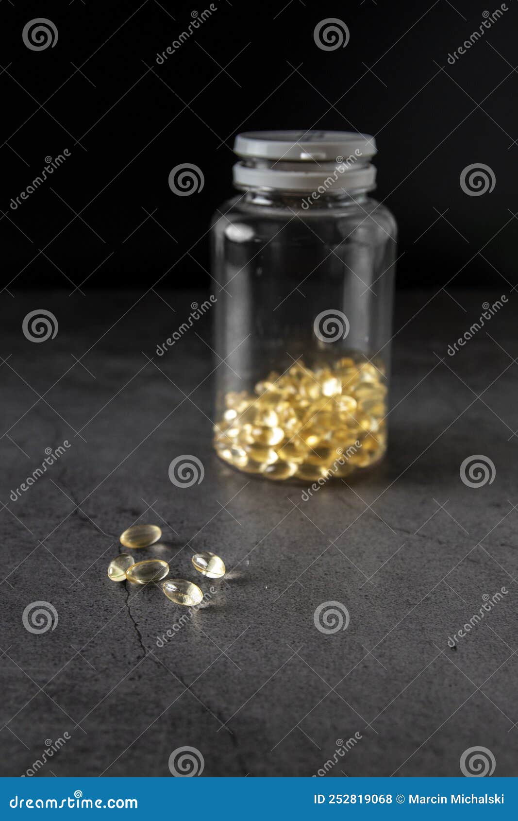 Vitamin D Caps on a Dark Background Stock Photo - Image of care ...