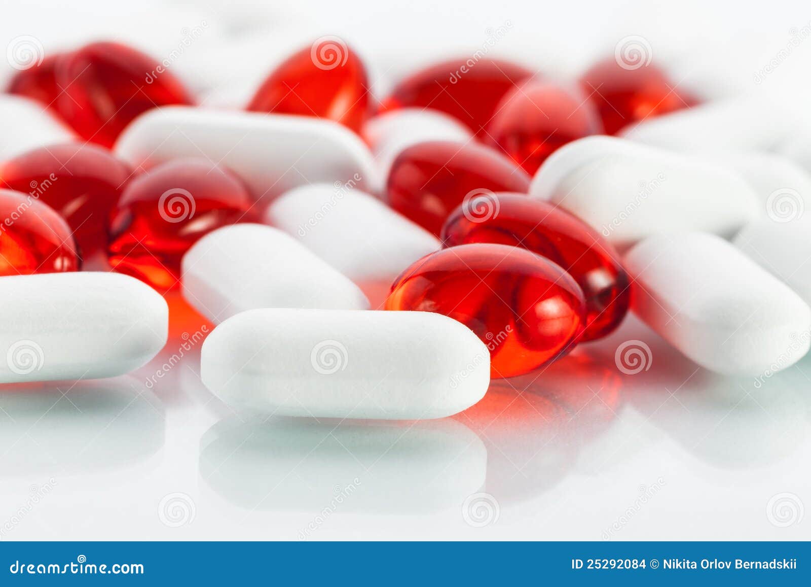 Vitamin Pills: Red Capsules and White Tabs Stock Photo - Image of ...