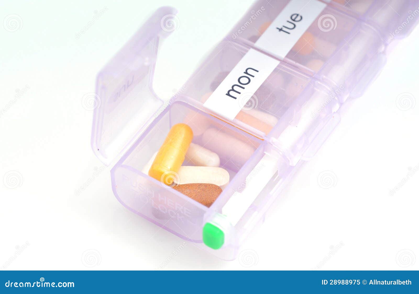 Daily Vitamins in pill box stock image. Image of weekly - 28988975