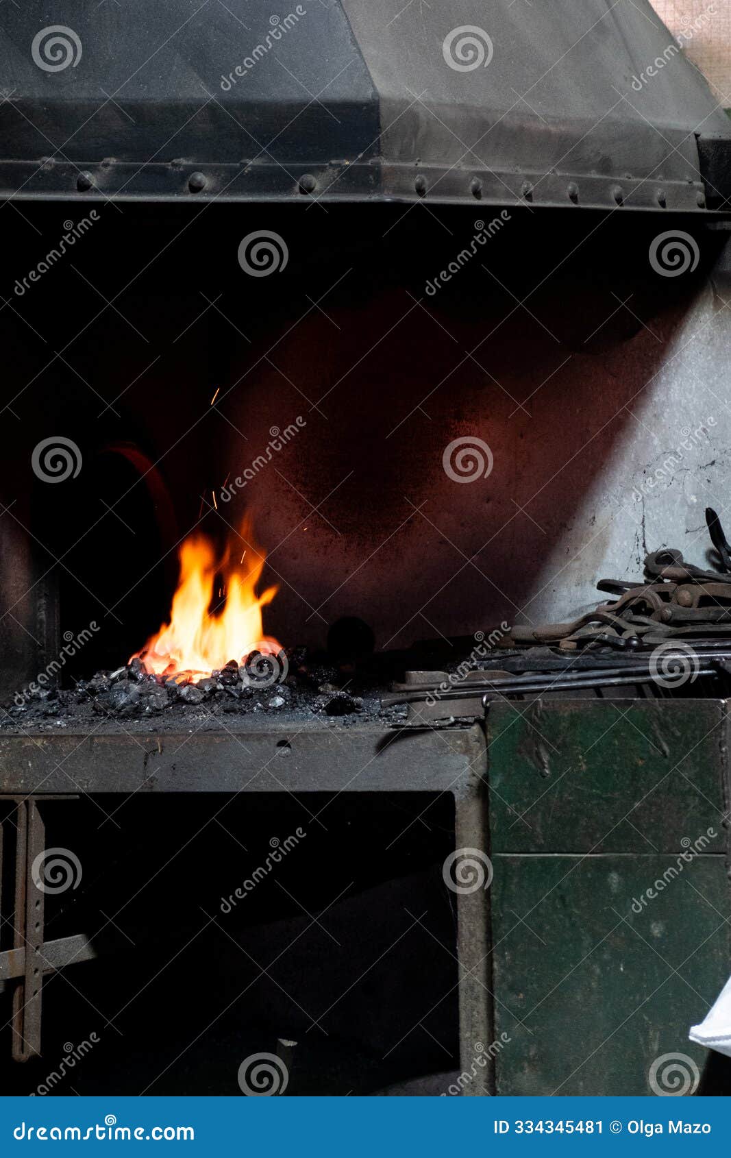Vivid Flames in a Traditional Blacksmith Forge, Surrounded by Rustic ...