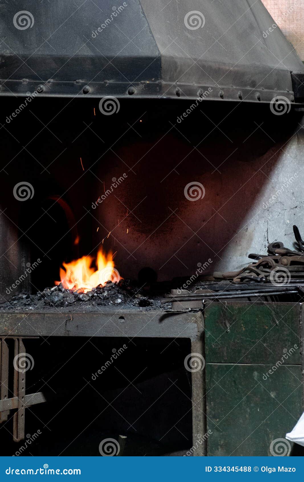 Vivid Flames in a Traditional Blacksmith Forge, Surrounded by Rustic ...