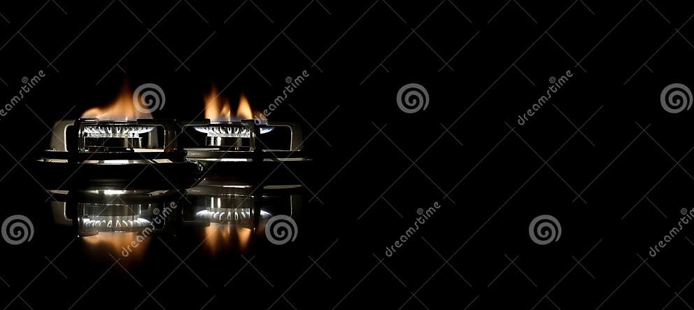Vivid Gas Burner Flame Casting Light into the Dark, Creating a ...