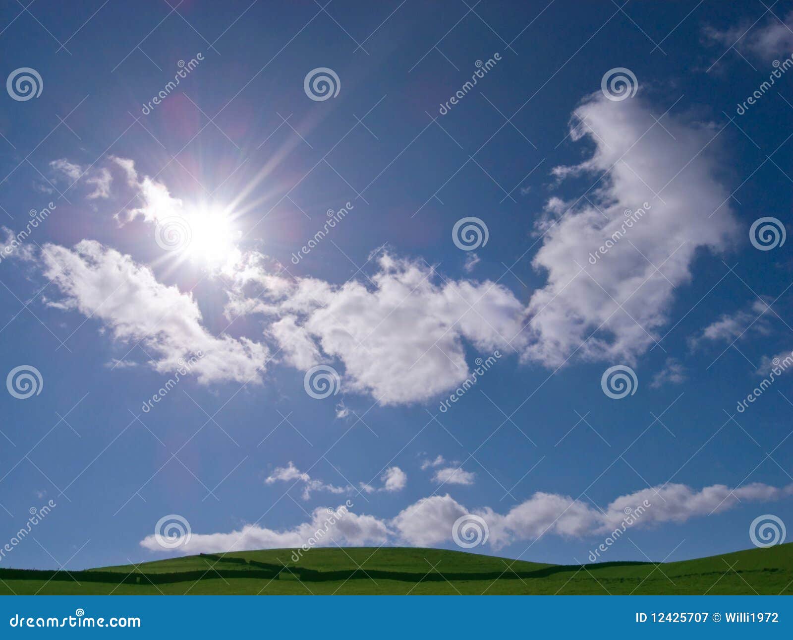 Vivid Sky and Field Showing Sun and Clouds Stock Image - Image of ...