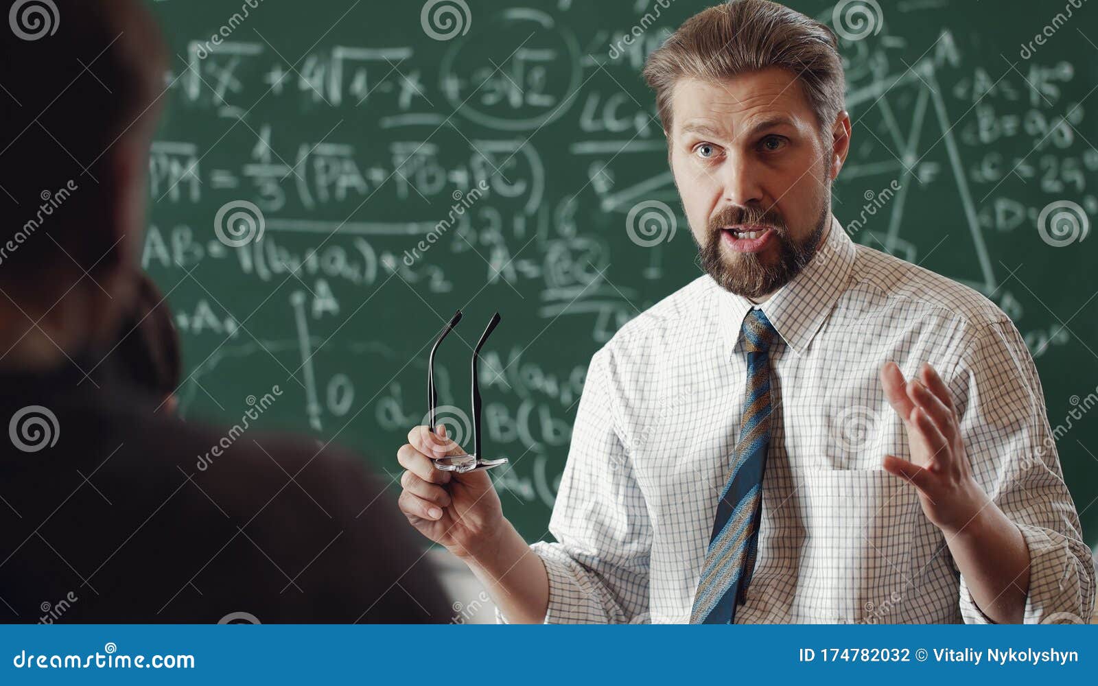 Vivid Teacher Explaining Math Theme Stock Photo - Image of blackboard ...