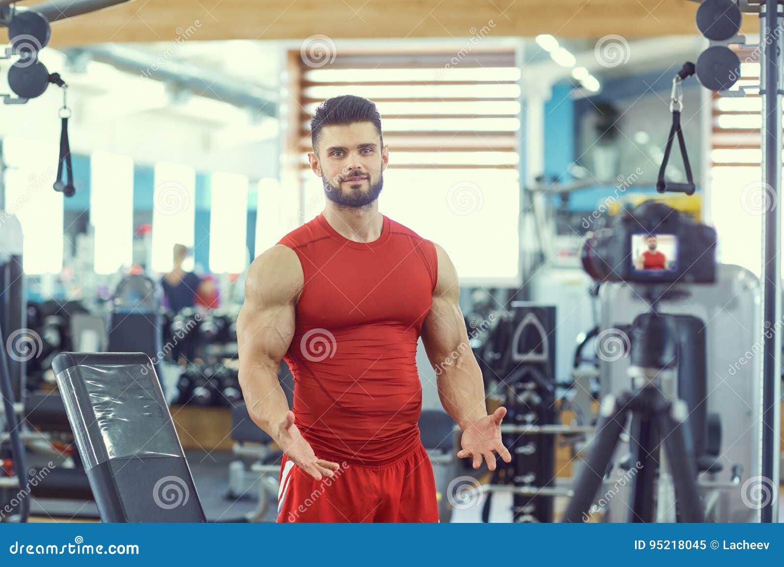 The Athlete Makes Lunges, Exercise To Warm Up Before Training. Male ...