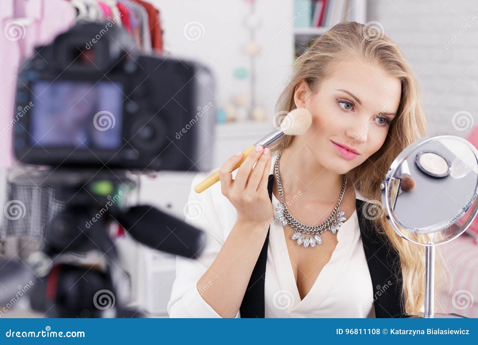 Vlogger shows make up stock photo. Image of video, media - 96811108