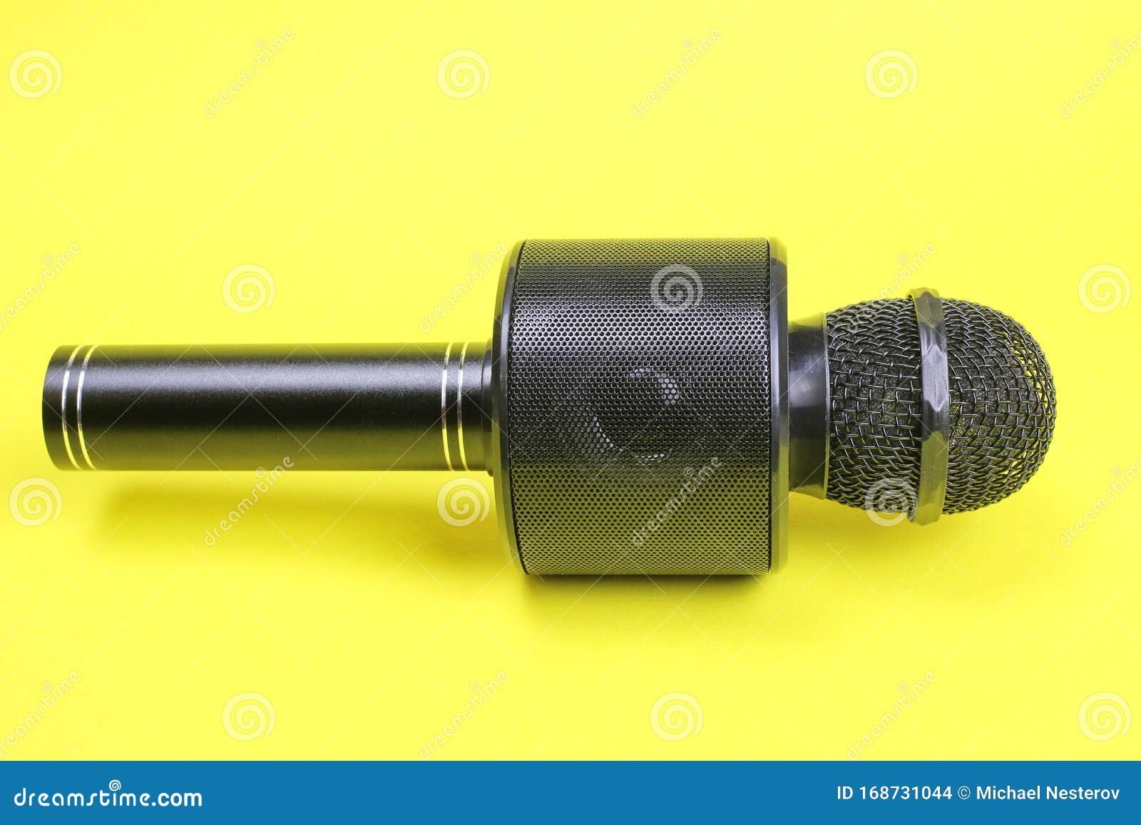 Vocal Bluetooth Microphone on Yellow Background Stock Photo - Image of ...