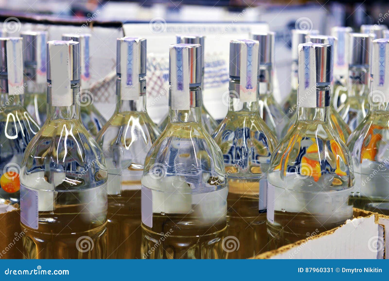 Vodka in a cardboard box stock image. Image of alcohol - 87960331