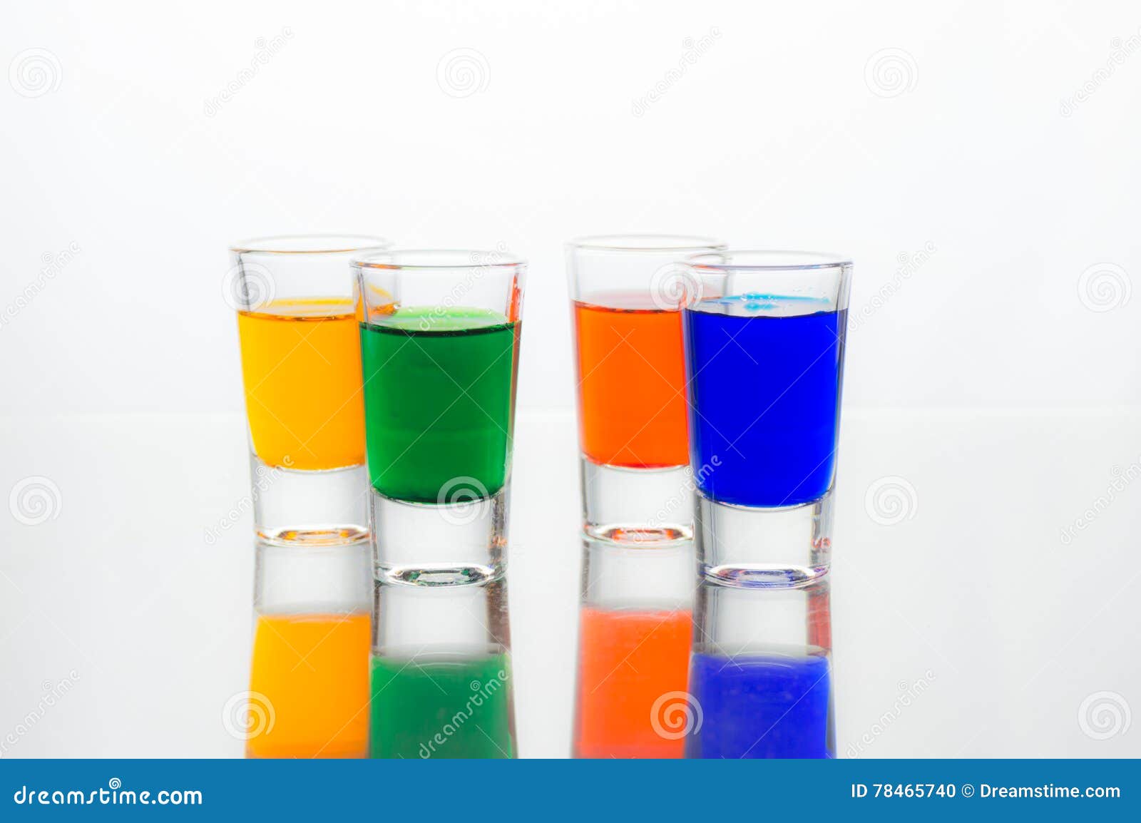 Vodka Color Shots Filled with Alcohol on Glass Bar Table Stock Photo ...