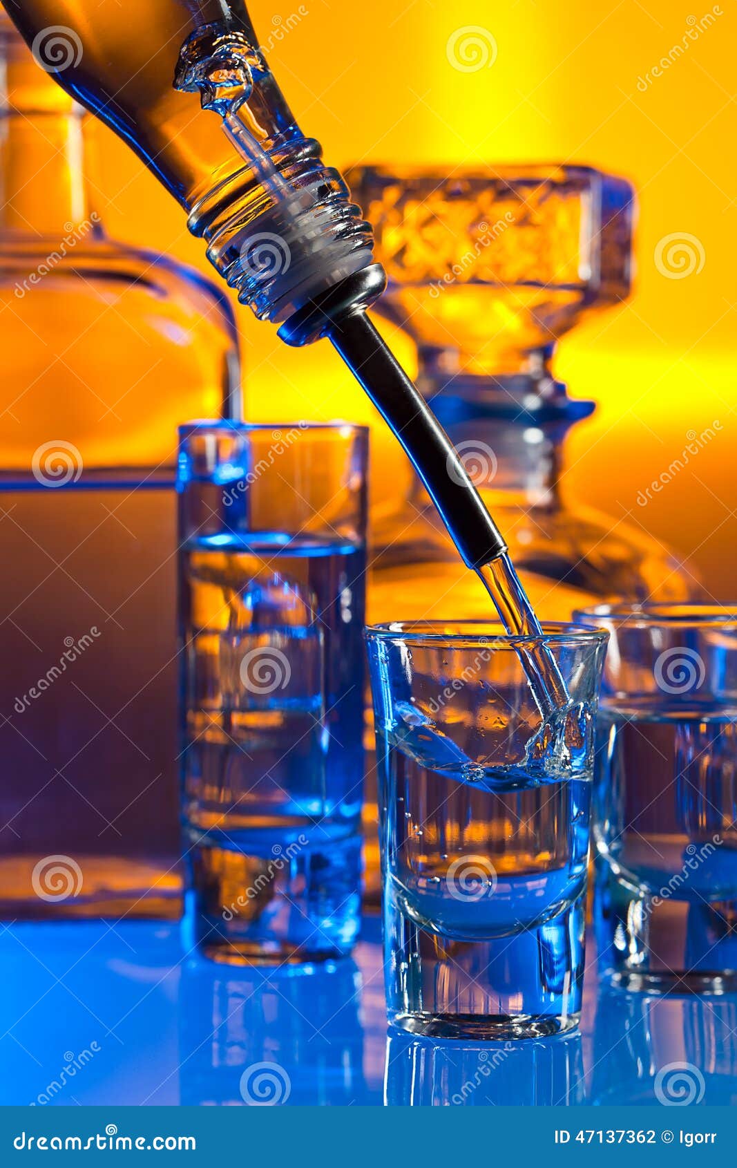Vodka on glass table stock photo. Image of reflection - 47137362