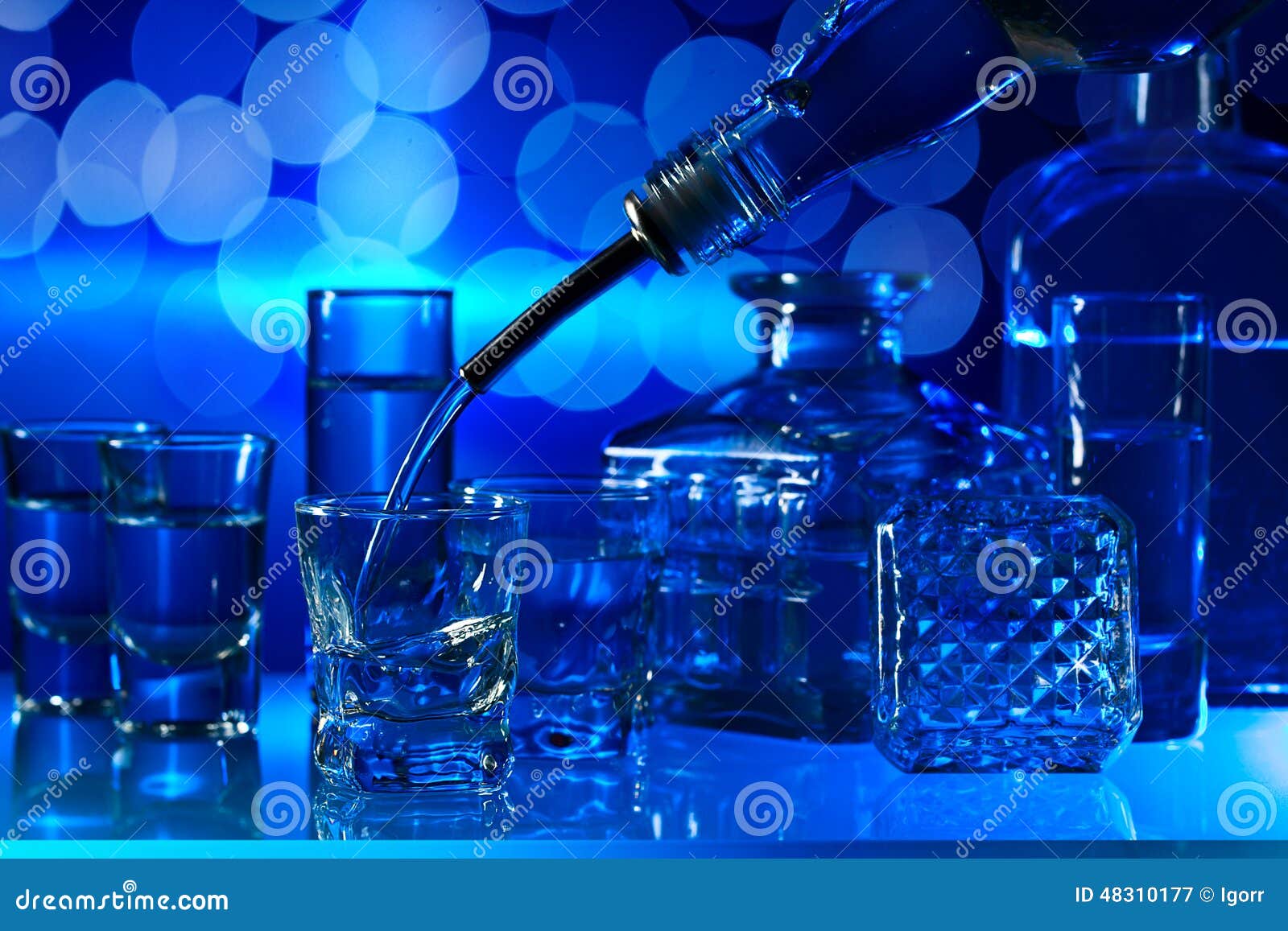 Vodka on glass table stock image. Image of bottle, hard - 48310177