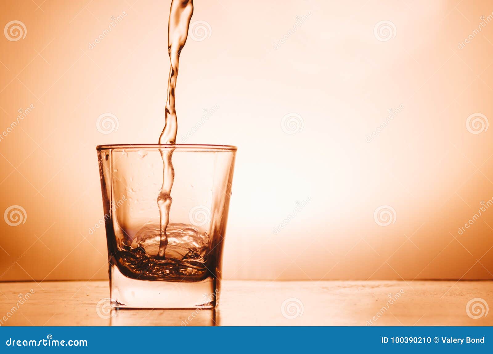 Vodka in Glass stock photo. Image of flowing, pouring - 100390210