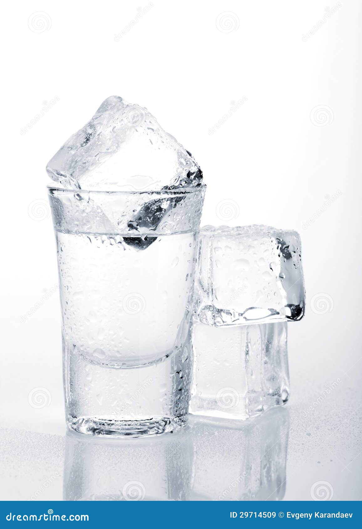 Vodka shot with ice cubes stock image. Image of liquor - 29714509