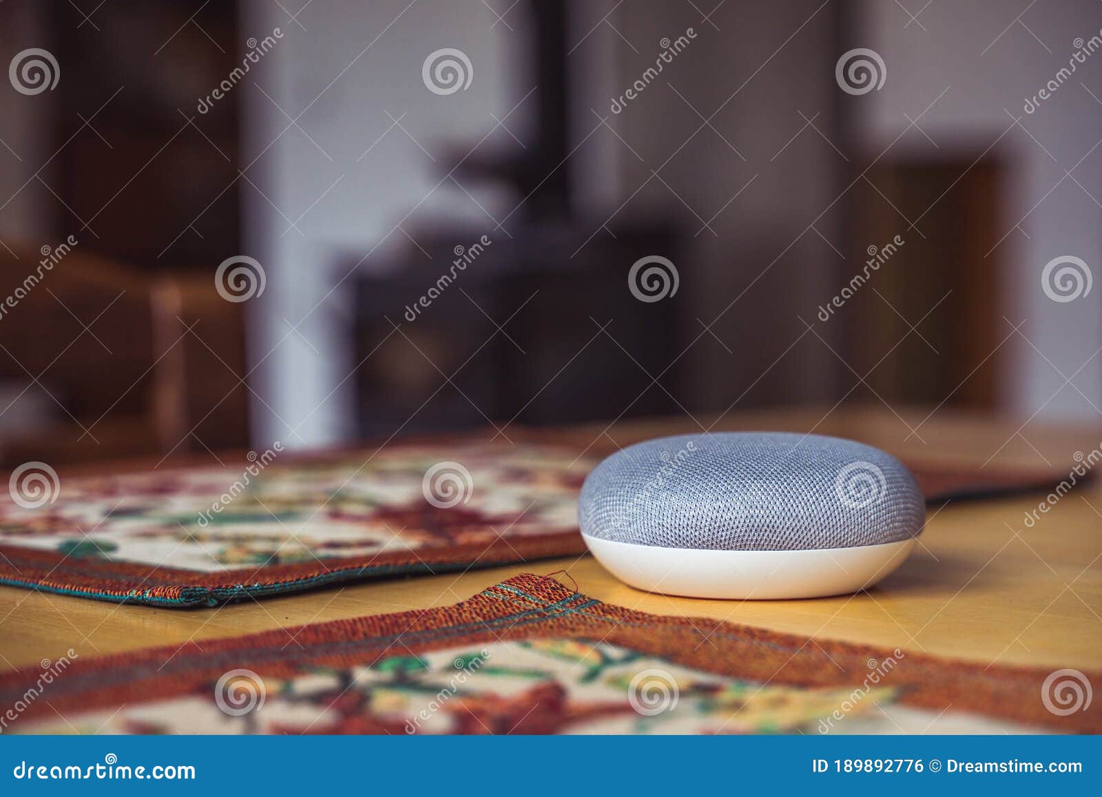 Voice Controlled Smart Speaker on a Dinning Table. Stock Photo - Image ...
