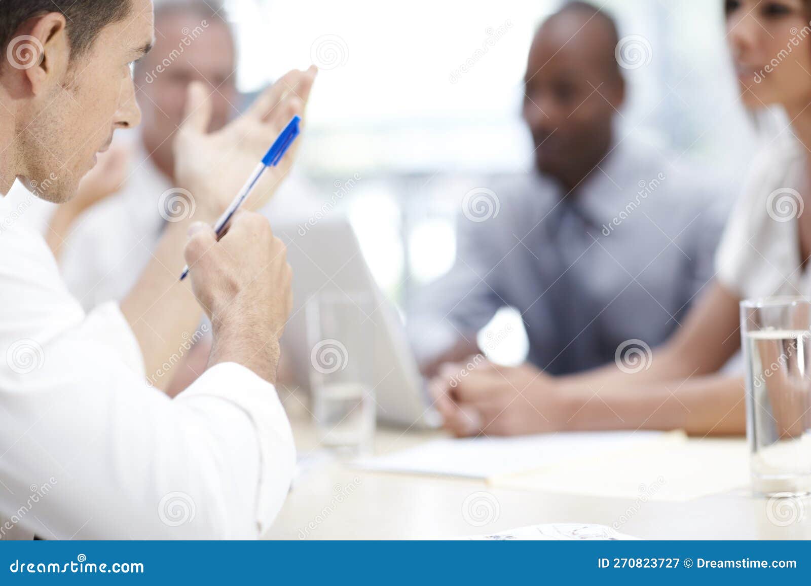 Voicing His Concerns about the Project. a Group of Businesspeople ...