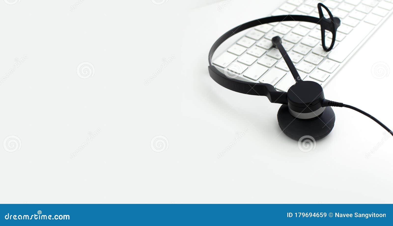 VOIP Headset on Laptop Computer Keyboard. Communication Support for ...