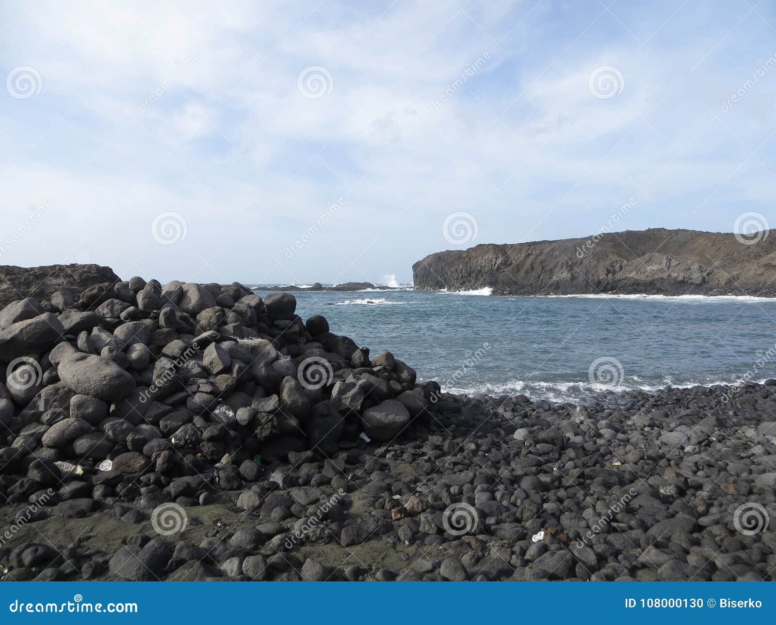 Volcanic beach stock photo. Image of volcanic, blue - 108000130