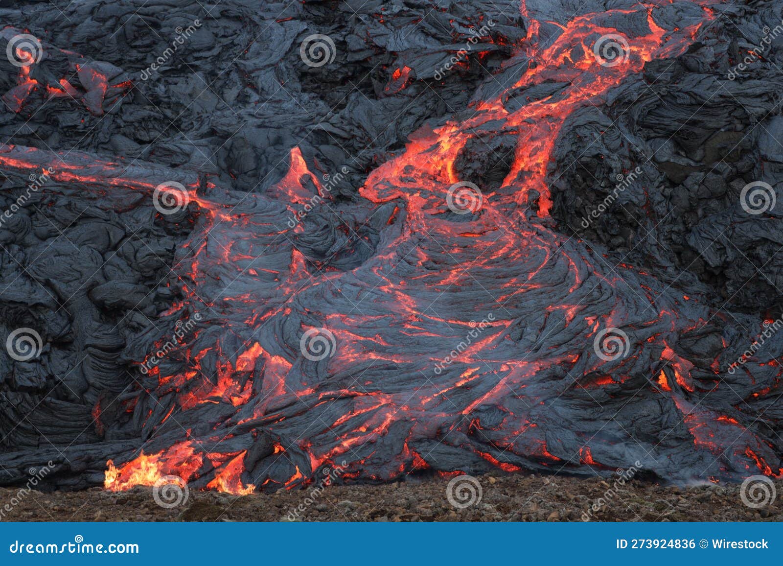 Volcanic Eruption with Glowing Orange Lava Flow Surrounded by a Pool of ...