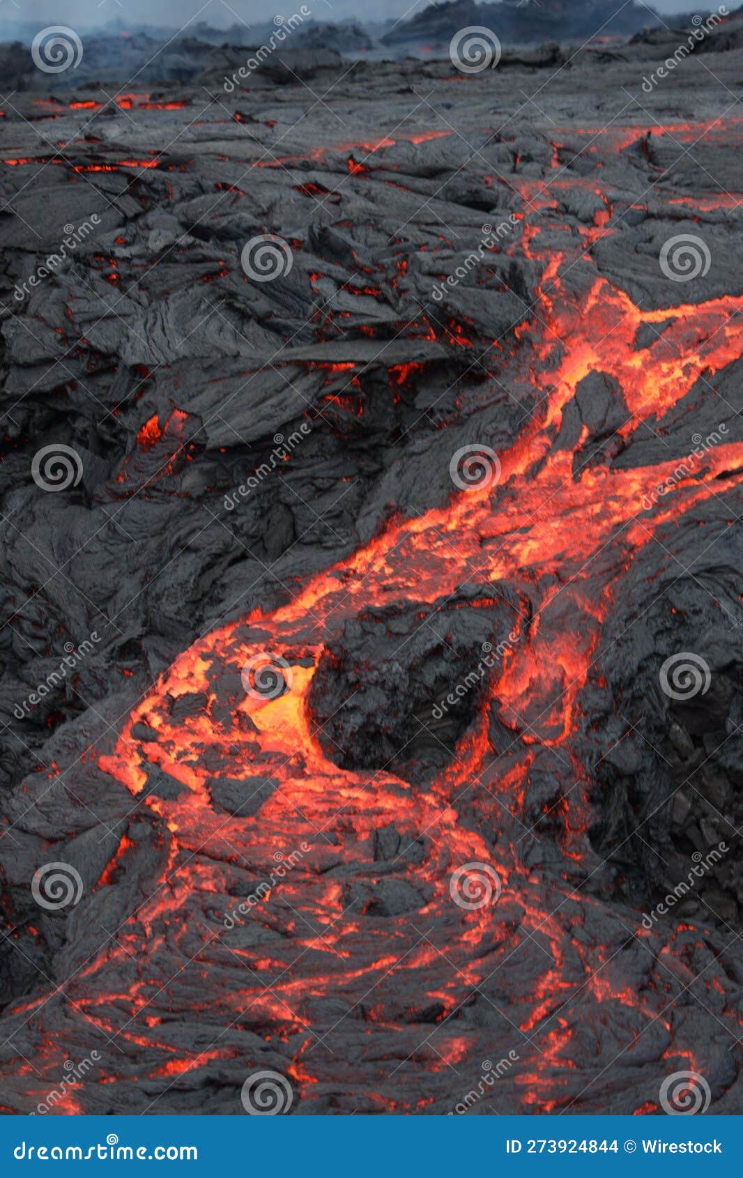 Volcanic Eruption with Glowing Orange Lava Flow Surrounded by a Pool of ...
