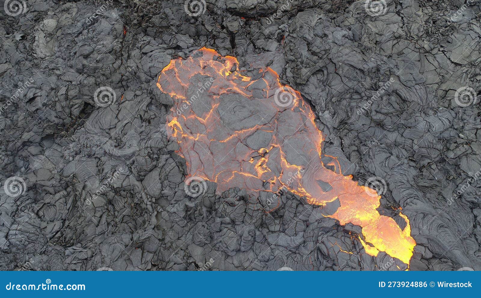 Volcanic Eruption with Glowing Orange Lava Flow Surrounded by a Pool of ...