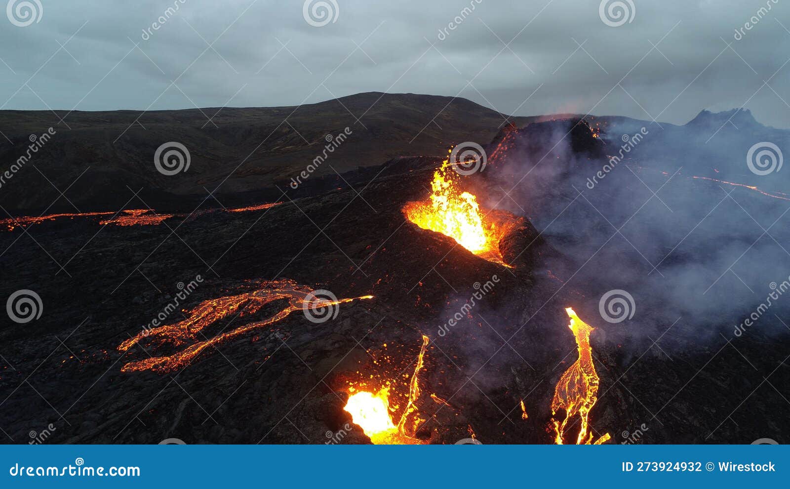 Volcanic Eruption with Glowing Orange Lava Flow Surrounded by a Pool of ...