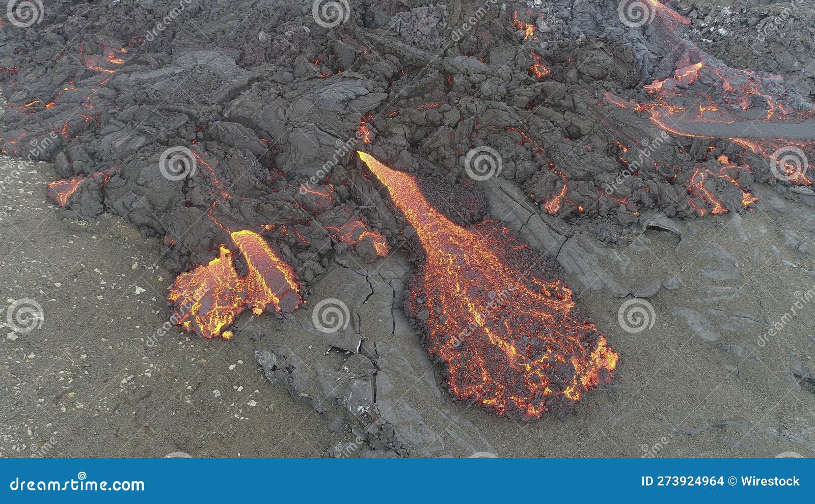 Volcanic Eruption with Glowing Orange Lava Flow Surrounded by a Pool of ...