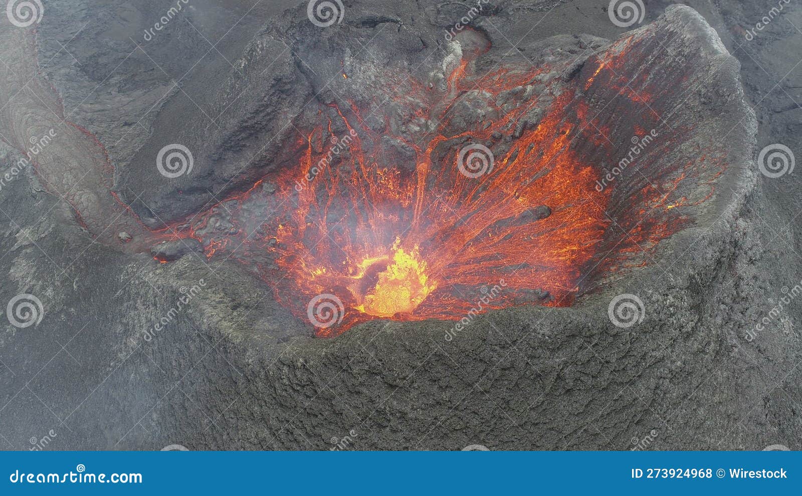 Volcanic Eruption with Glowing Orange Lava Flow Surrounded by a Pool of ...