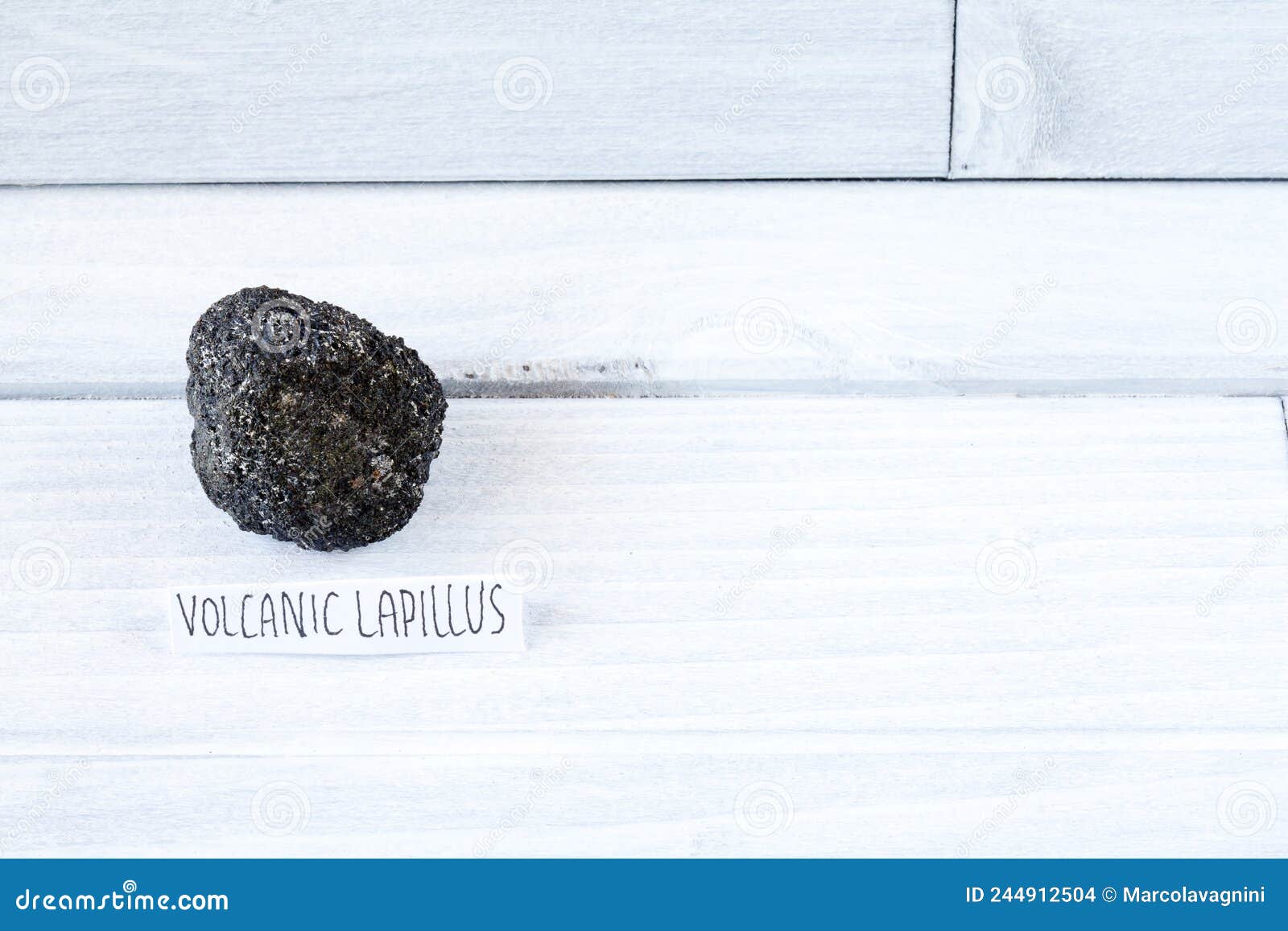 Volcanic Lapillus on White Wood Table Stock Photo - Image of rock ...