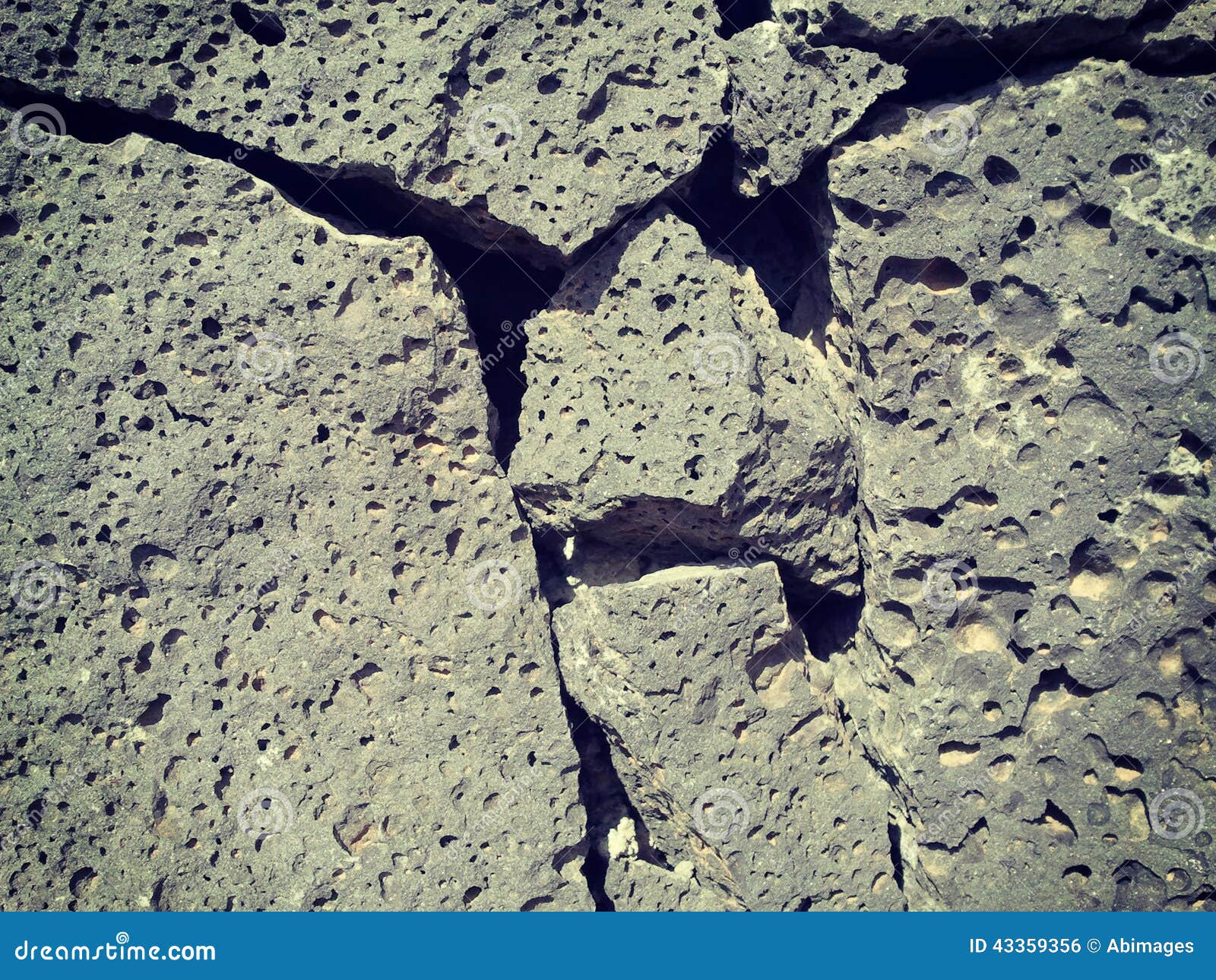 Volcanic rock wall stock photo. Image of rough, lava - 43359356