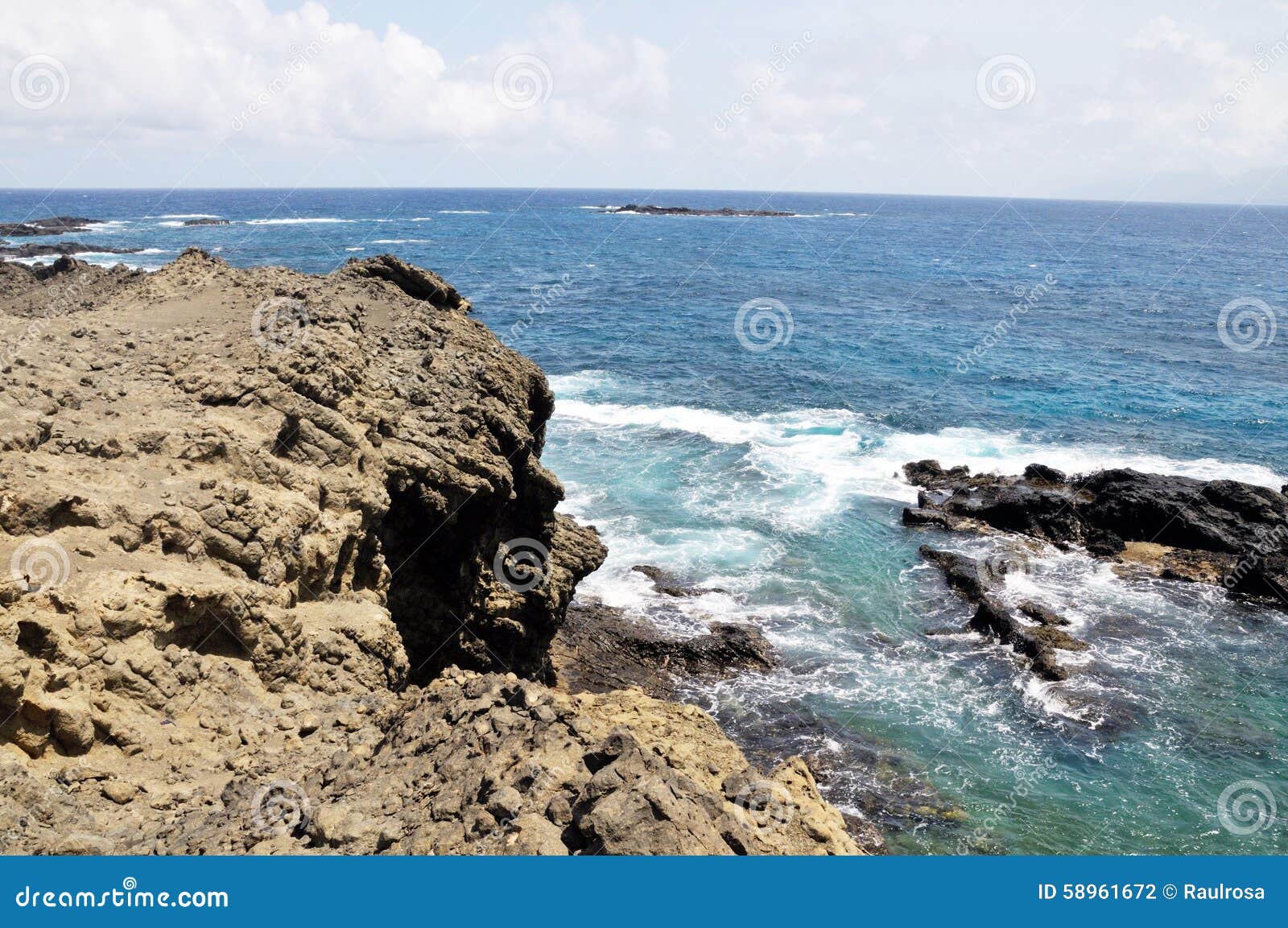 Volcanic Rocks in the Ocean Near Cliff Stock Photo - Image of atlantic ...