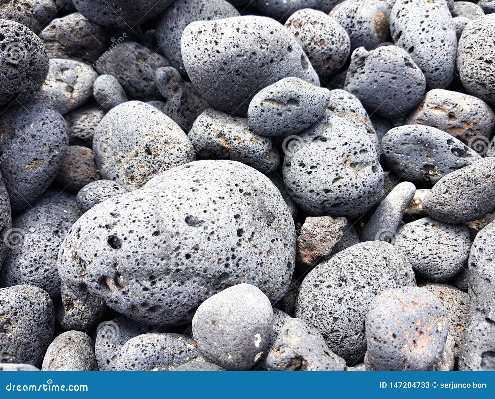 Volcanic Rocks Rounded by the Aleaje of the Sea on a Beach in Lanzarote ...