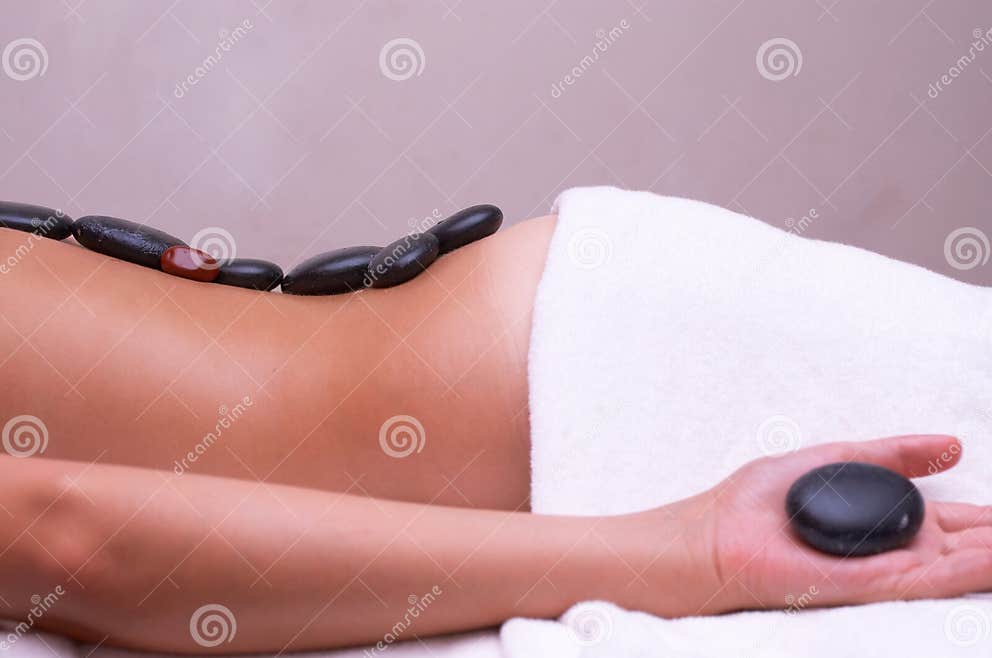 Volcanic stone massage stock photo. Image of healing, relax - 1227546