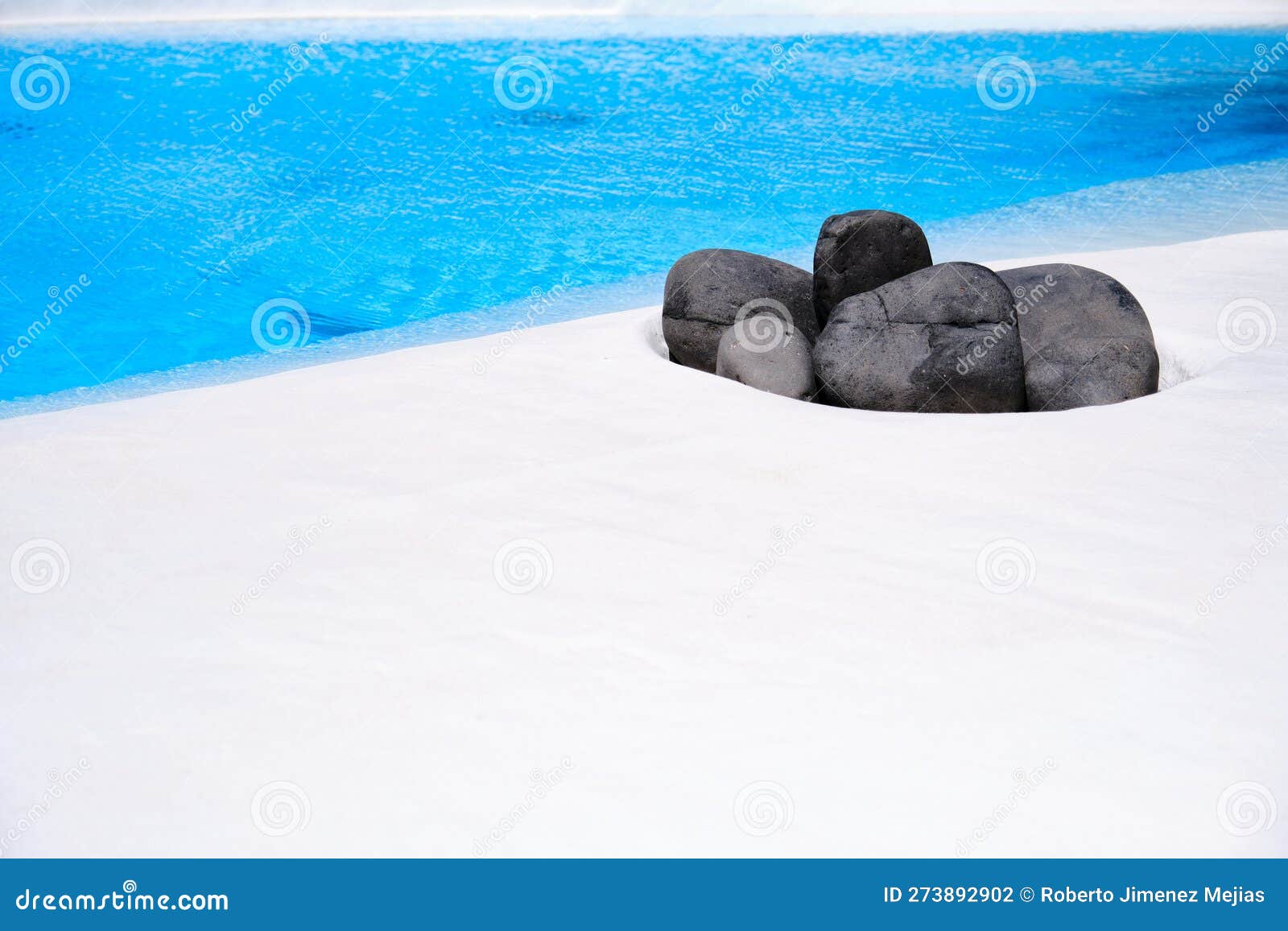 Volcanic Stones Next To a Swimming Pool. Stock Photo - Image of stone ...
