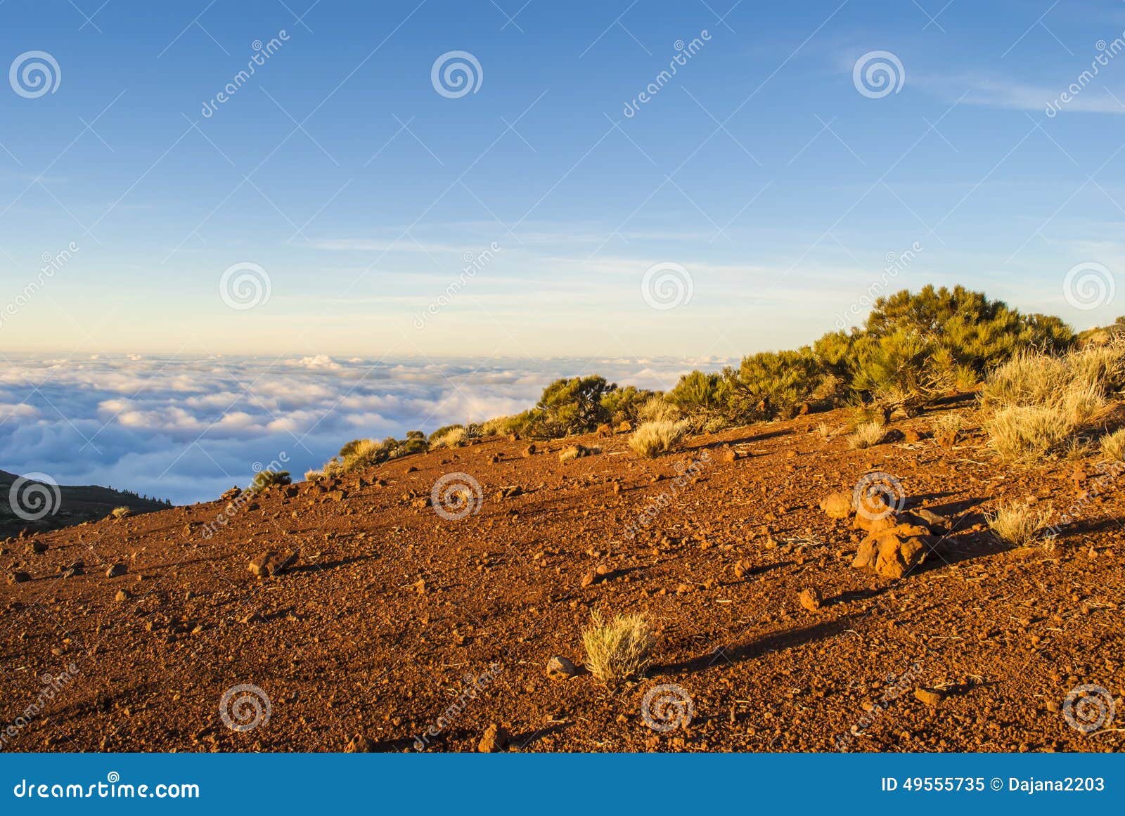 Volcano (above the clouds) stock image. Image of dusty - 49555735