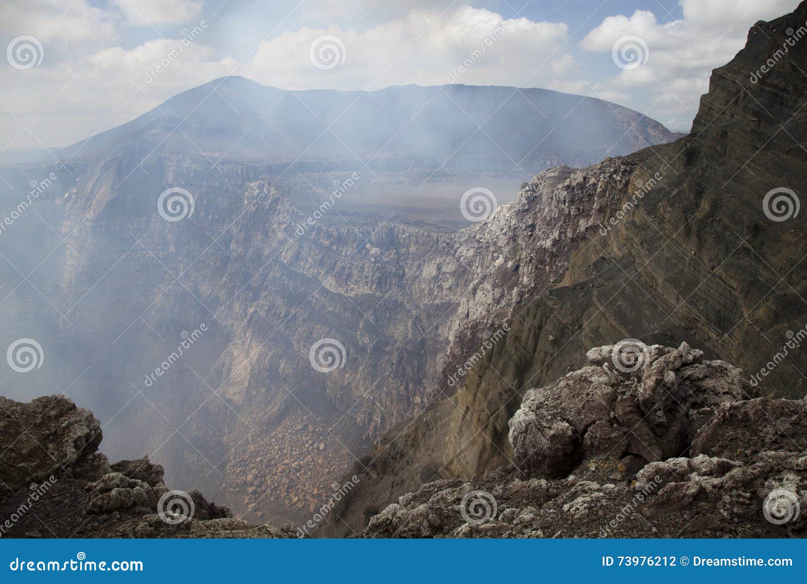 Volcano and the hole stock photo. Image of geologic, skies - 73976212