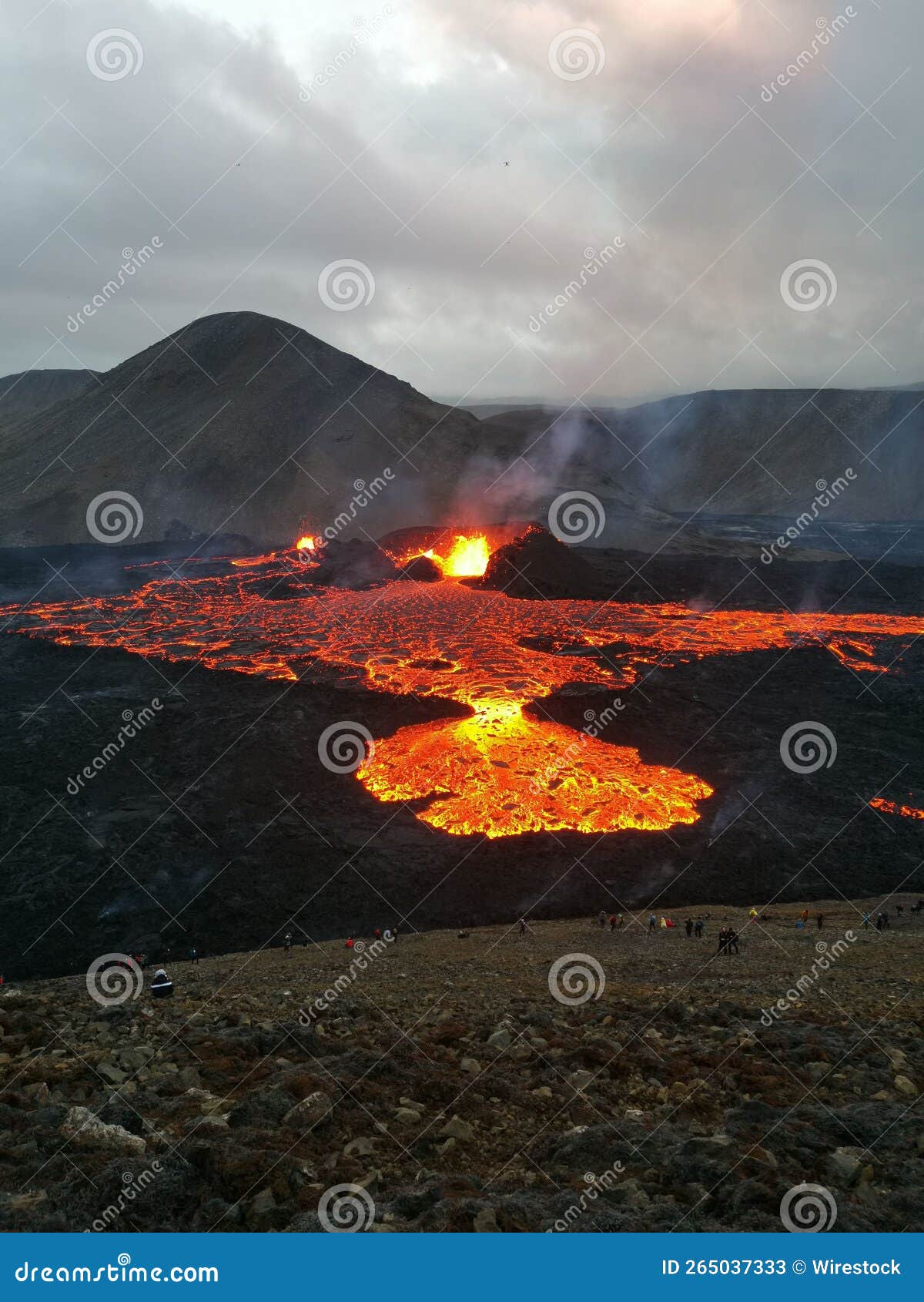 Volcano with Lava Pouring into the Air from a Crater Stock Image ...